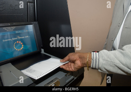 Representatives from the company Dominion Voting demonstrate the ...