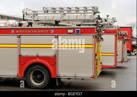 Three Fire Engines rear lockers Stock Photo - Alamy