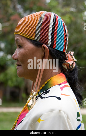 Kelabit women with the traditional colourful cap and elongated earlobes ...