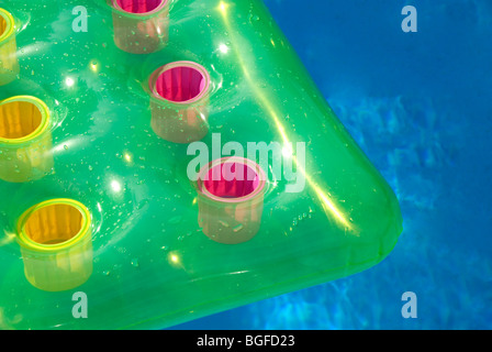 Section of inflatable sun bed floating in swimming [pool Stock Photo ...