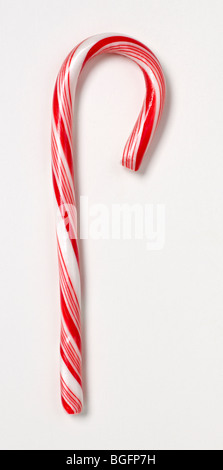 Candy cane on a red background with a sprig of fir. Christmas,New Year ...