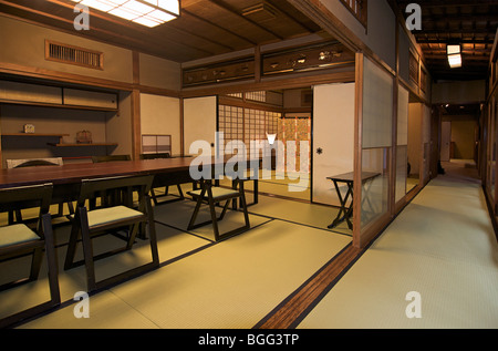Traditional Japanese style hotel room with tatami mats and futon bed ...
