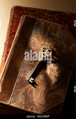 Antique Books And Key Stock Photo - Alamy