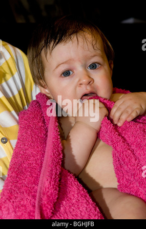9 months old baby drying up with towel Stock Photo - Alamy