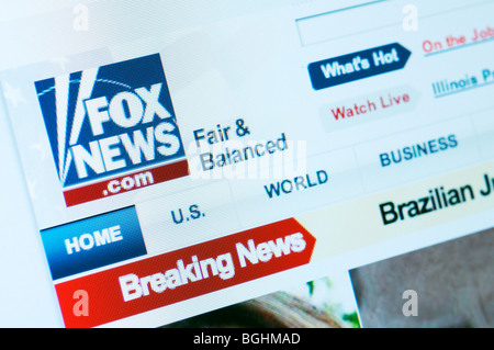 Fox News website homepage. Fox News channel logo visible through a ...
