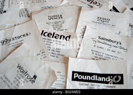 scattered till receipts from british supermarkets Stock Photo - Alamy