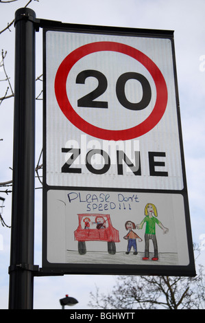 20 mph zone sign with children`s picture, Warwick, UK Stock Photo - Alamy