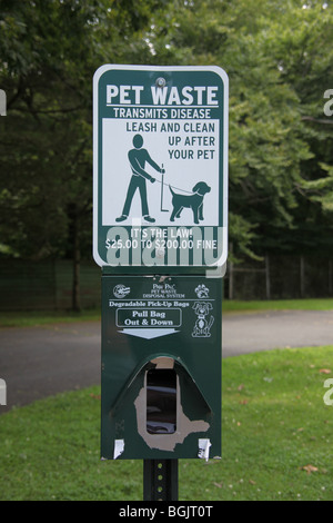 Pet Waste Station in Park Stock Photo - Alamy