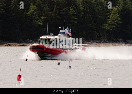 25' Defender Class US Coast Guard RB-S Patrol boat jumps over a wave on ...