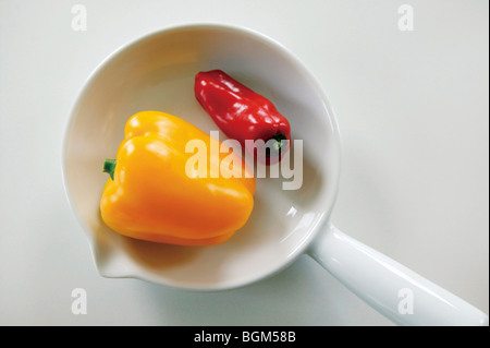 Yellow and red paprika bell pepper. Close up. Dark background Stock ...