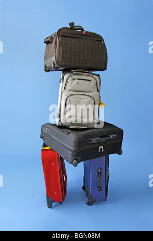 Family with packed suitcases Stock Photo - Alamy