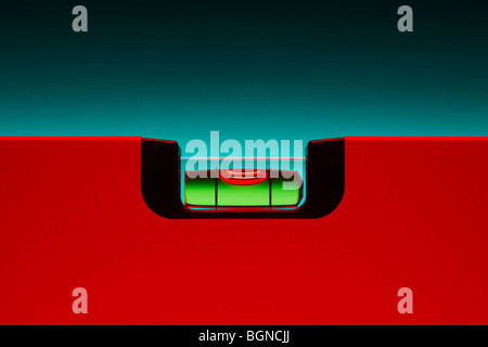 Red spirit level with bubble to balance the surface with clipping path ...