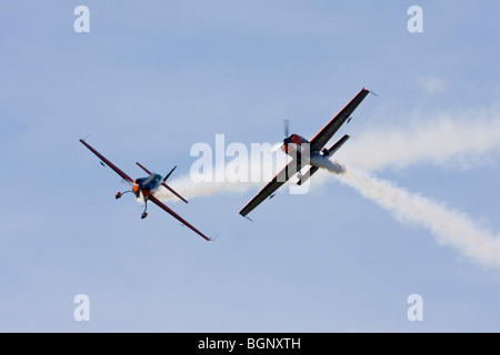 Blades aerobatic display team flying Extra 300 LP aircraft at RAF ...