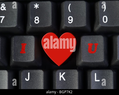 I Love You acronym arranged from computer keyboard keys I and U and red ...