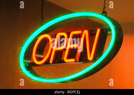 Yellow and Green neon 'Open' sign Stock Photo - Alamy