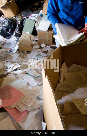 Manual sorting of different types of paper at the collection point of ...