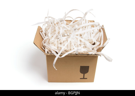 Cardboard box full of shredded cardboard recycled packing material ...