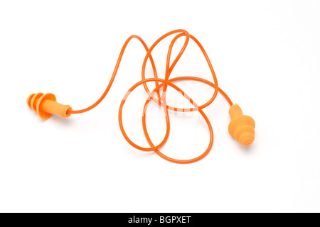 Orange color ear plugs isolated on white background Stock Photo - Alamy