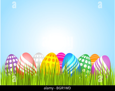Colourful Easter eggs in grass Stock Photo - Alamy