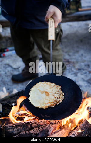 Pancakes made over open fire Stock Photo - Alamy