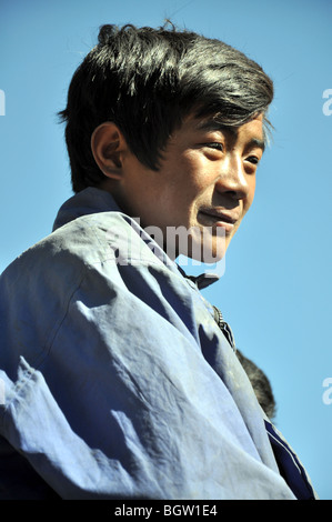Handsome smiling young Nepalese man with tilak and traditional hat ...