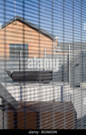 high down prison new cell block Stock Photo - Alamy