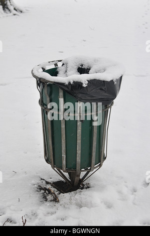 Snow-covered litter bins Stock Photo - Alamy