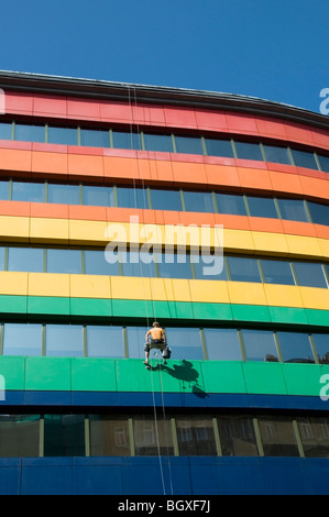 Male window cleaner in office Stock Photo - Alamy