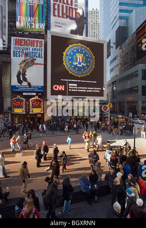 A billboard showing the FBI's most-wanted is seen in Times Square in ...