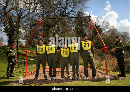 BOYS ARE ASSESSED DURING A TEAM PHYSICAL PROBLEM SOLVING EXERCISE AT ...
