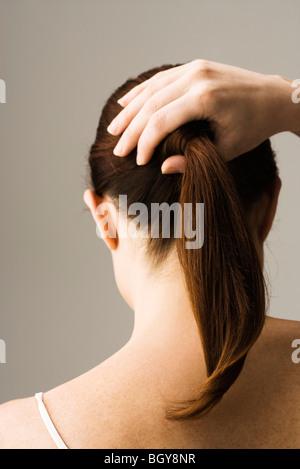 Rear view of ponytail of gray hair of Caucasian woman Stock Photo - Alamy