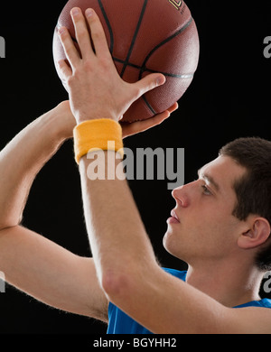 Male basketball player. Studio shot over white Stock Photo - Alamy