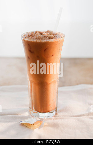 Closeup shot of a glass of iced coffee on a table Stock Photo - Alamy