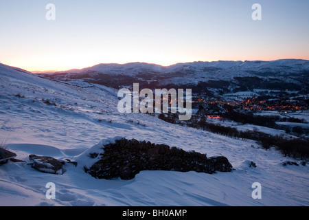 Ambleside in winters snow at dusk from Todd crag, Lake District, UK ...