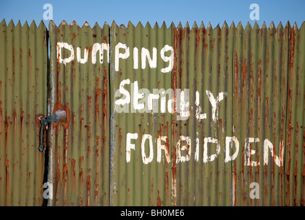Corrugated metal fence with No Entry Sign Stock Photo - Alamy