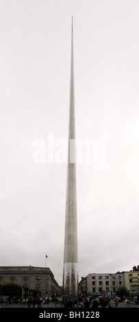 millennium needle spire of dublin monument of light with autumn trees ...