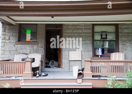 Residence with condemned notice and COMBAT sign posted. Narcotics ...