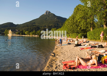 People relaxing at beach Lake Fuschl Fuschl am See Salzkammergut ...