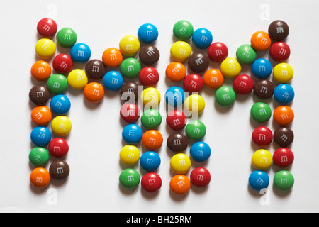 choco M&Ms sweets arranged in two letter Ms Stock Photo - Alamy