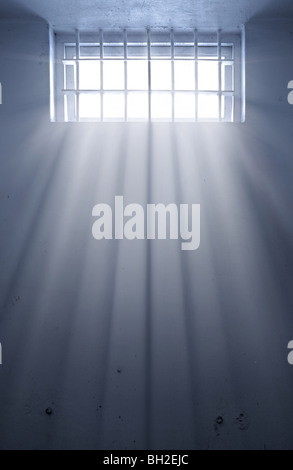 Cold prison cell with sunshine through window Stock Photo - Alamy
