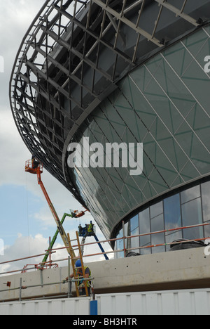 Construction of a modern arena type stadium Stock Photo - Alamy