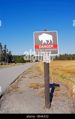 Yellowstone National Park warning signs about the danger level of ...