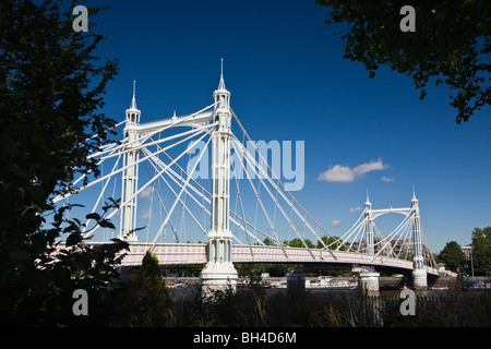 The Albert Bridge over the Thames River in London at dusk Stock Photo ...
