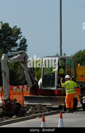 Digging up the pavement Stock Photo - Alamy