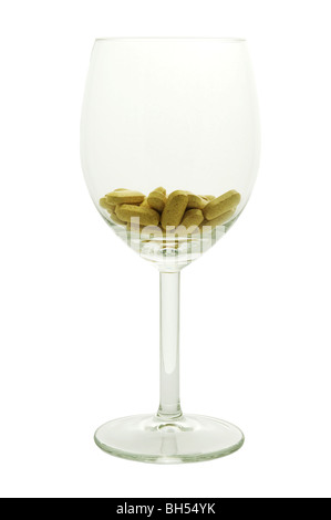 Wineglass with pills. Addiction concept Stock Photo - Alamy