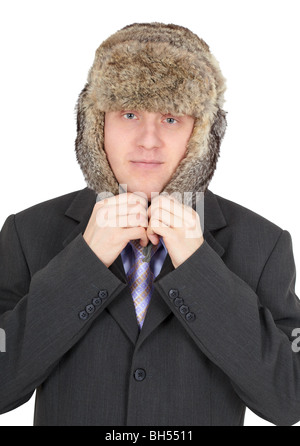 Man puts on head a fur hat Stock Photo - Alamy