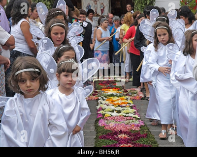 Young girls dressed as angels during a religious parade procession at ...