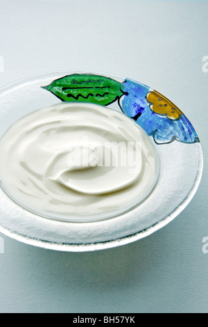 fresh natural yogurt in glass on wooden plank Stock Photo - Alamy