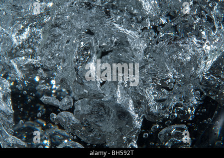 Water boiling in a glass container Stock Photo - Alamy