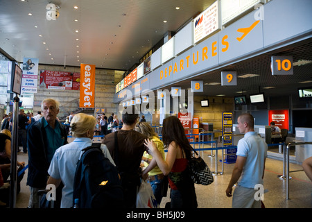 Travellers at the Easyjet airline check in at North terminal, Gatwick ...